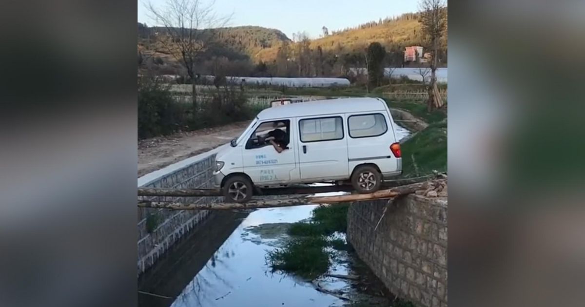 Would you drive your van over a river using a monkey bridge? | CarExpert