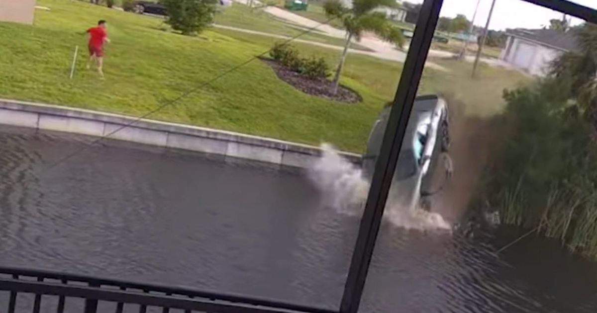 Dodge Challenger wants to become a boat in wild, watery crash | CarExpert