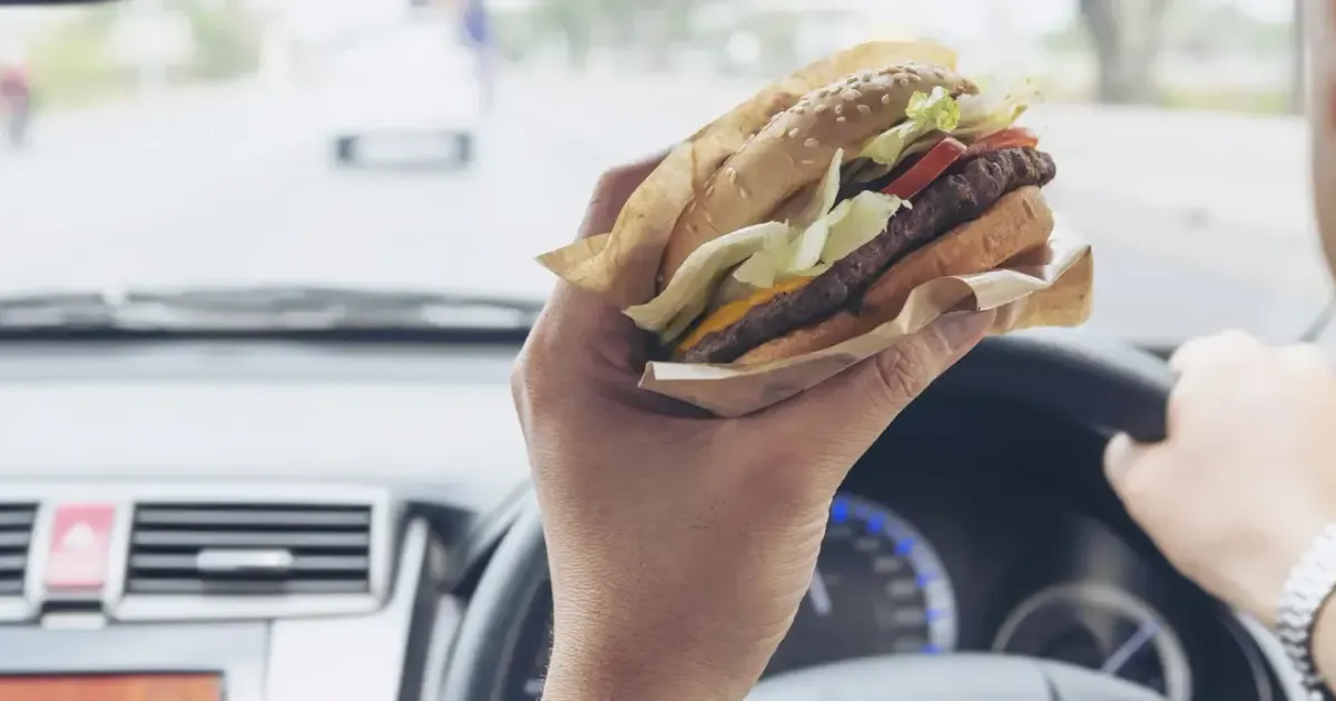 Is it illegal to eat while driving in Australia? | CarExpert