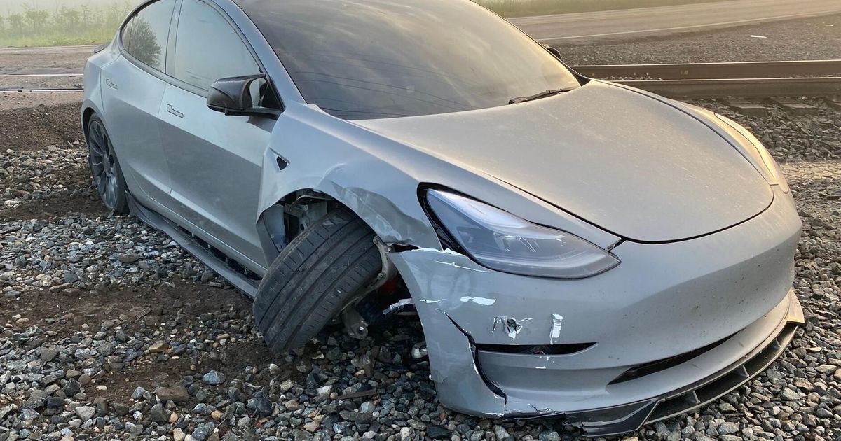 Watch as this Tesla almost Full Self-Drives into a train | CarExpert