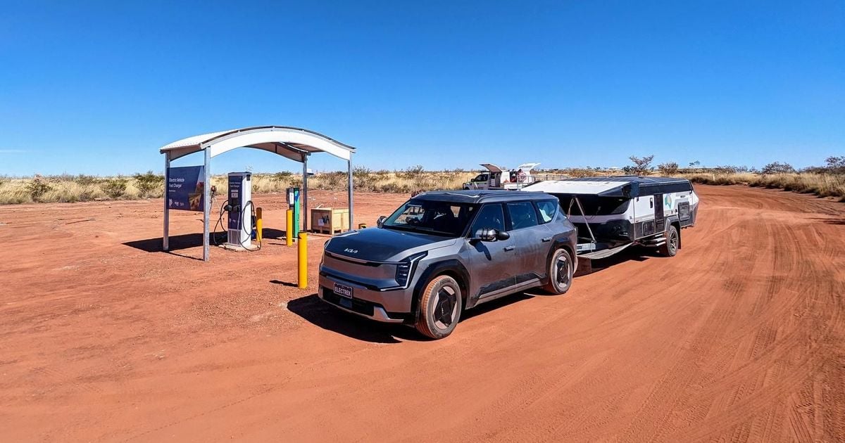 Family towing camper across Australia in an EV to prove ScoMo and ...