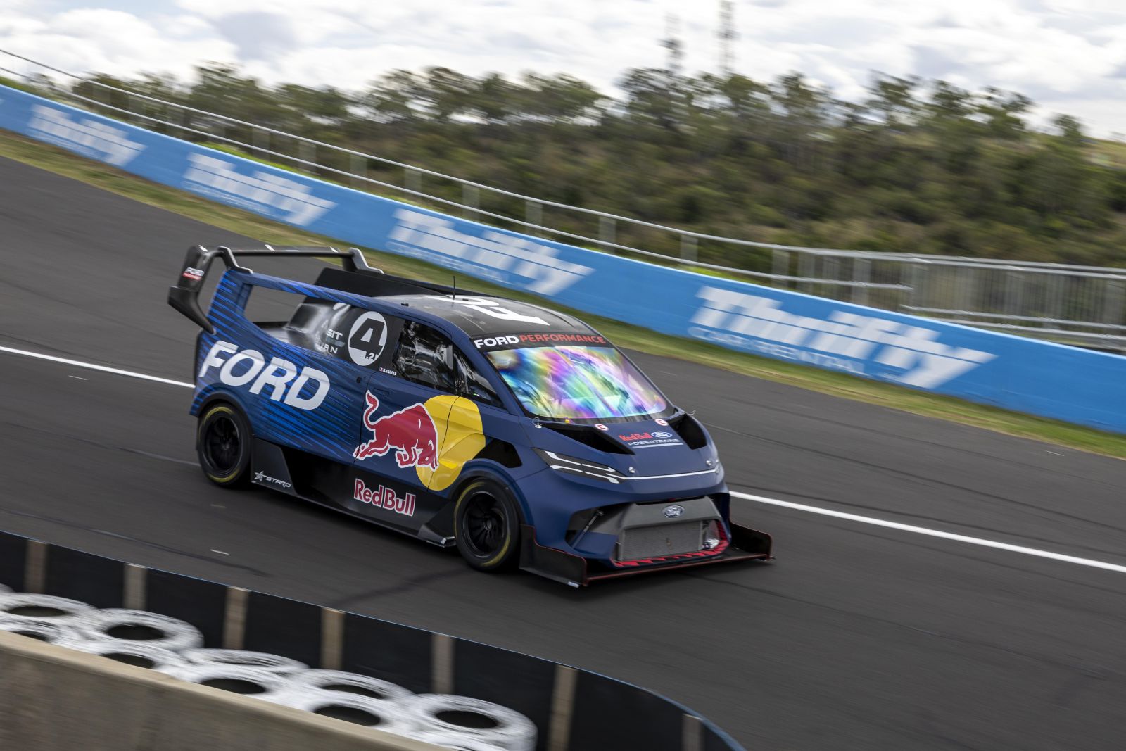 A brain-rearranging ride in the electric Ford SuperVan | CarExpert