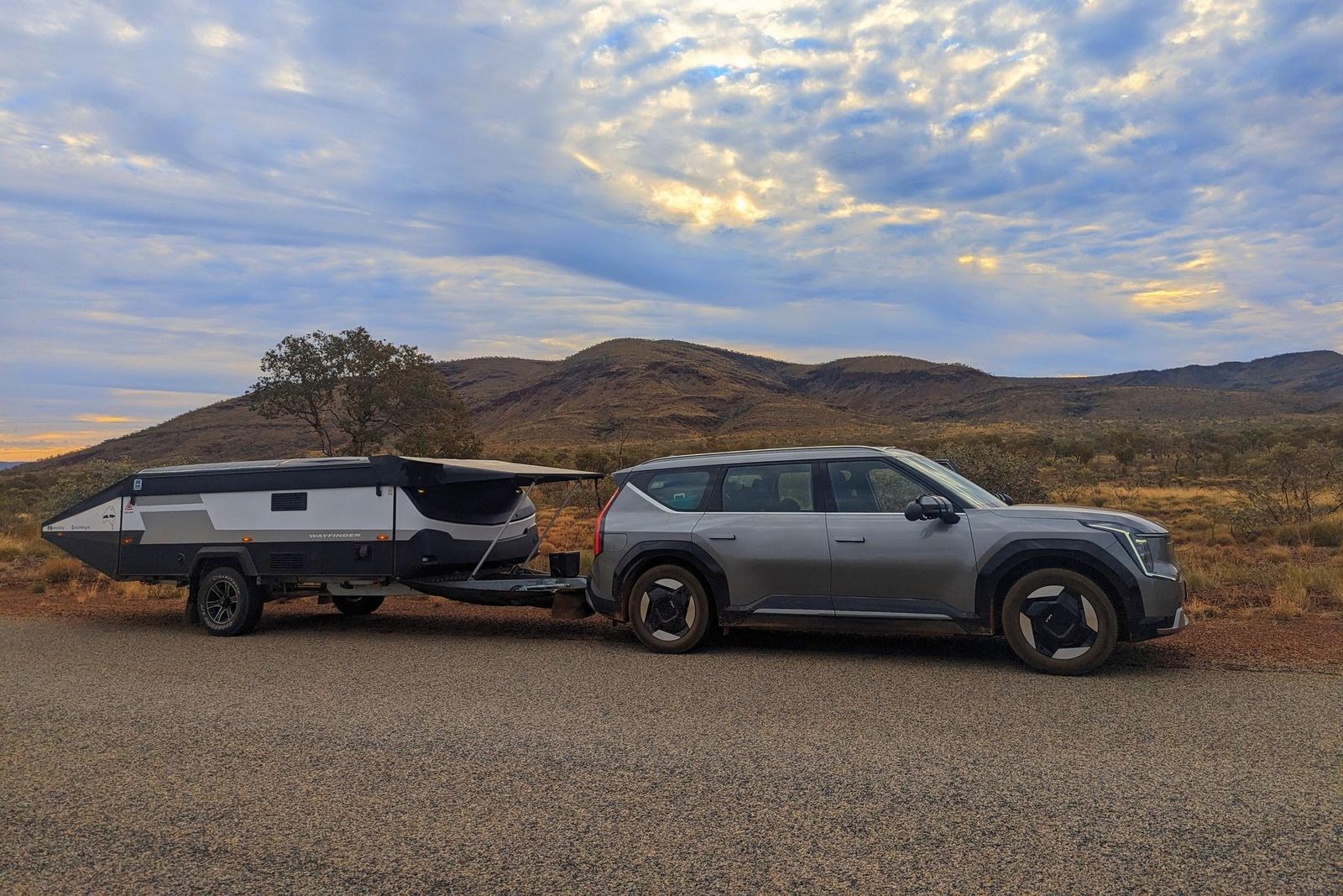 Family towing camper across Australia in an EV to prove ScoMo and ...