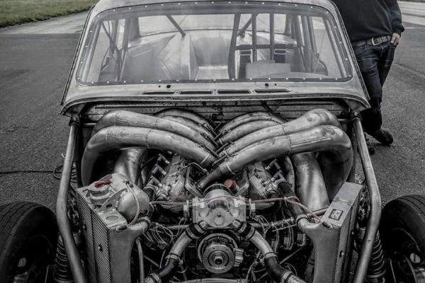 This V8 Volvo uses a two-stroke home-made boat engine, and it sounds ...