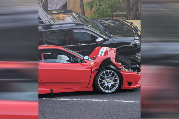 Rare Ferrari crashes into and upends pickup truck on Melbourne street ...