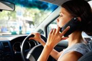 Is it illegal to use a mobile phone while driving? | CarExpert