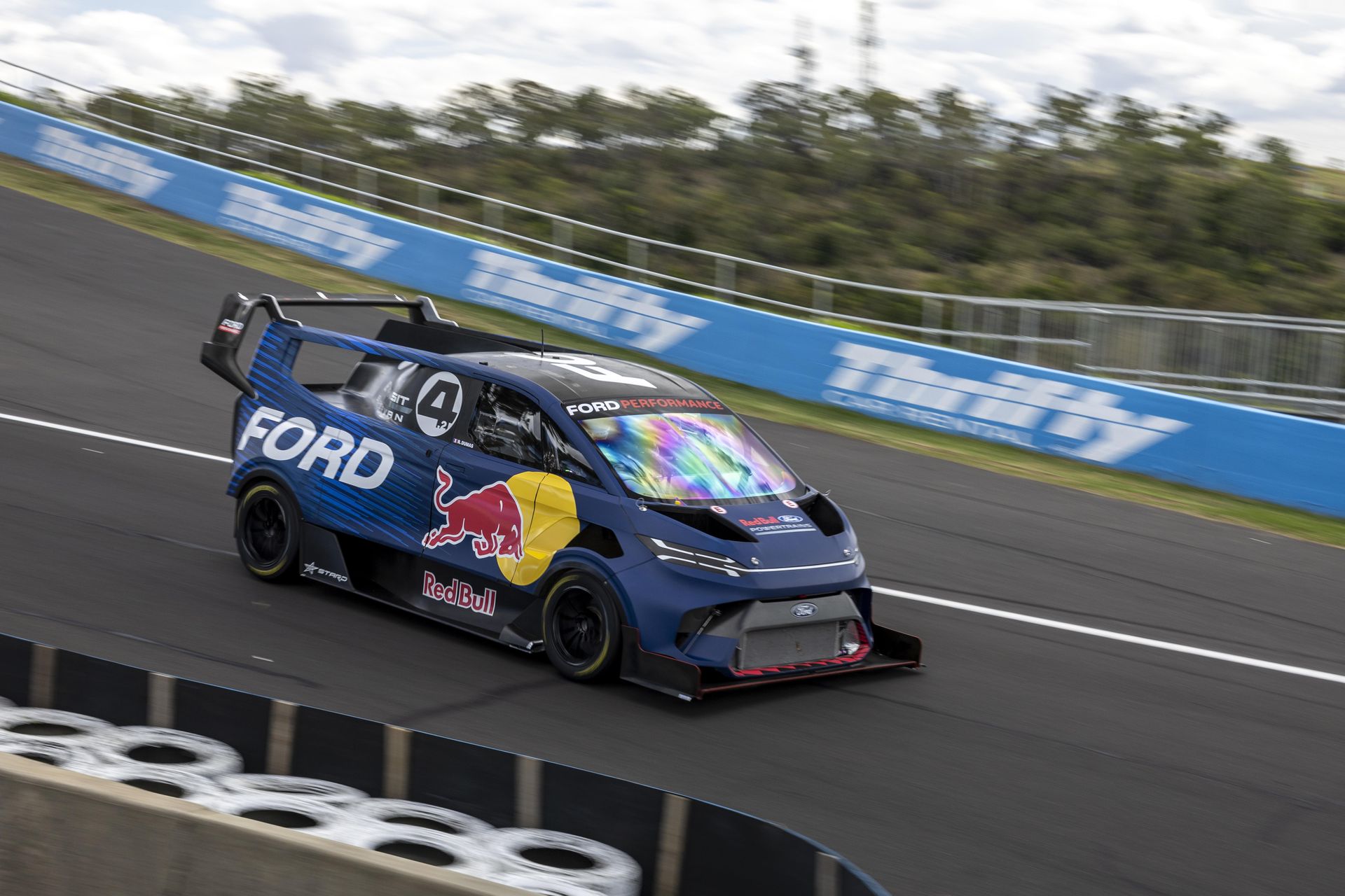 A brain-rearranging ride in the electric Ford SuperVan | CarExpert