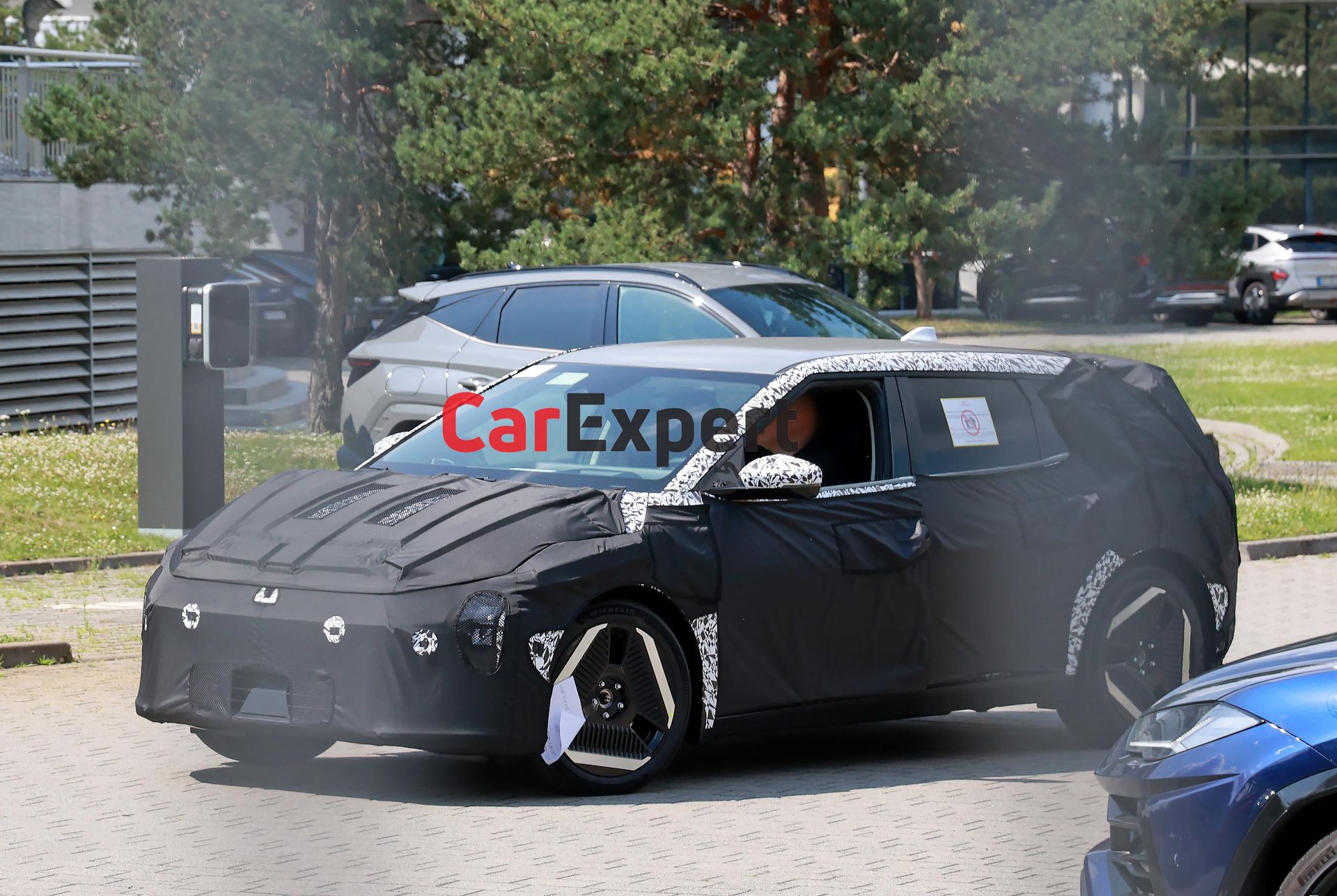 2025 Kia EV4 hatch shaping as more practical Tesla Model 3 rival ...