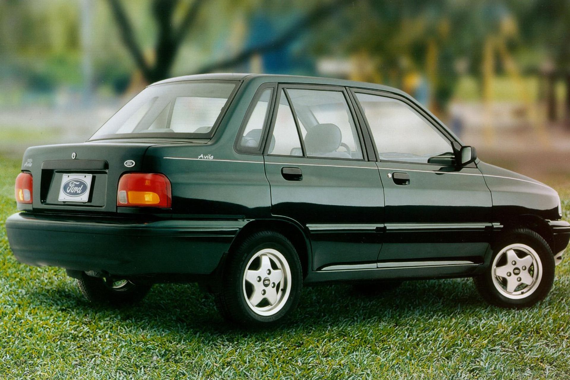 Kia's Mazda 121, Ford Festiva twin reborn as EV... with a manual ...
