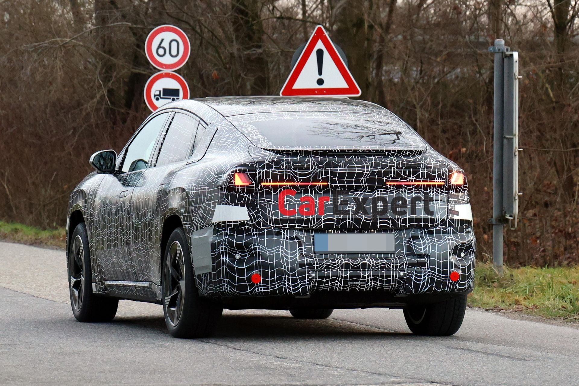 2027 BMW iX4 fastback electric SUV spied | CarExpert