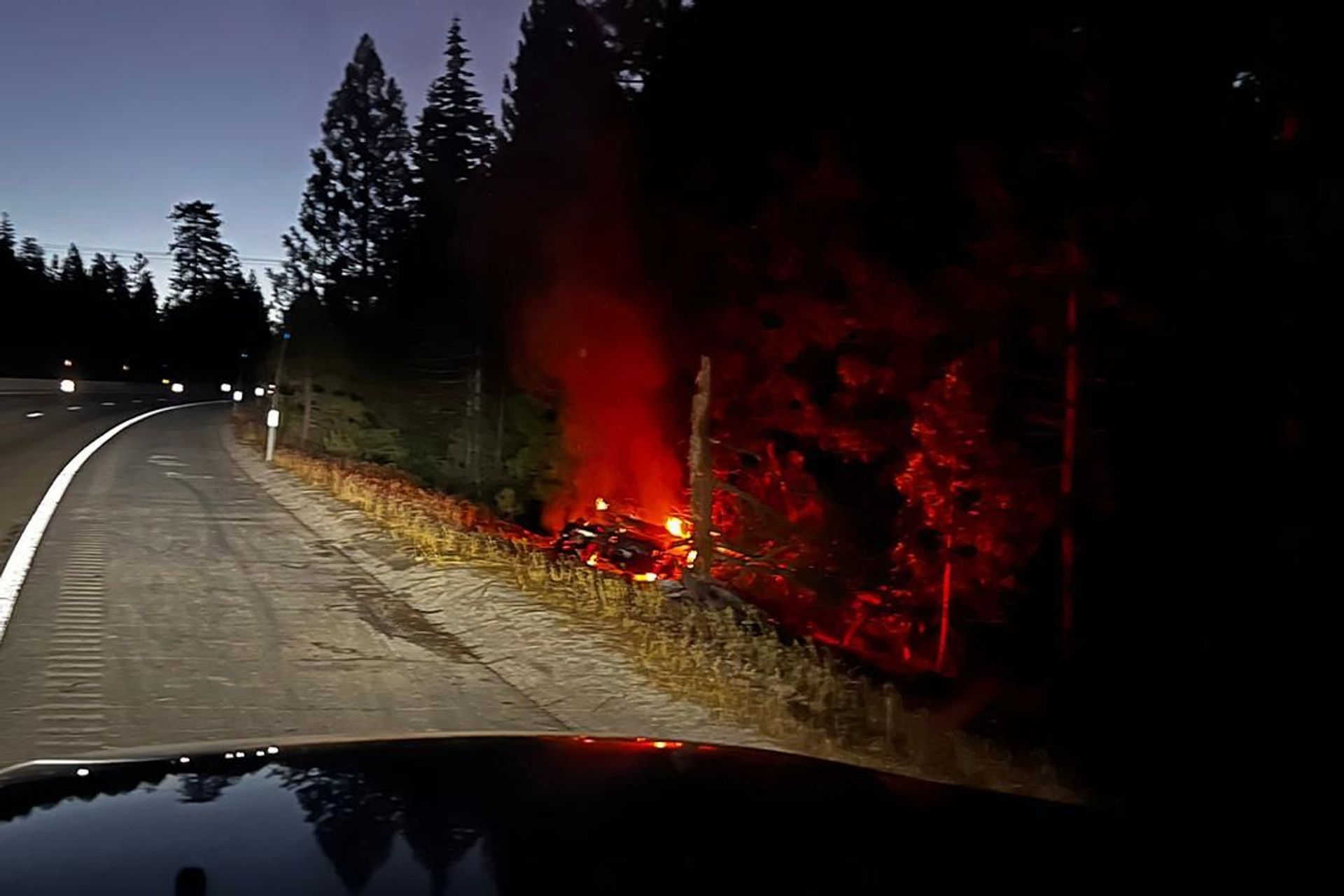 EV battery fire engulfs Tesla truck after highway crash | CarExpert