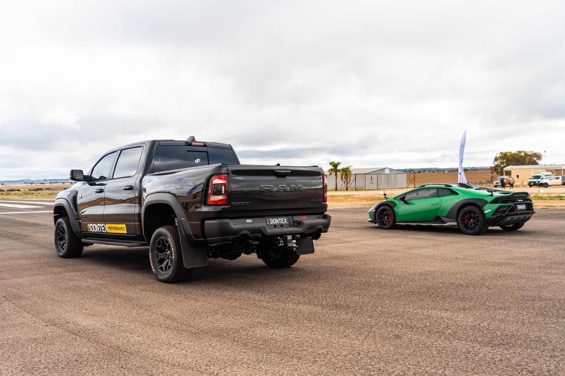 1200hp RAM TRX vs Lamborghini Huracan Sterrato drag race | CarExpert