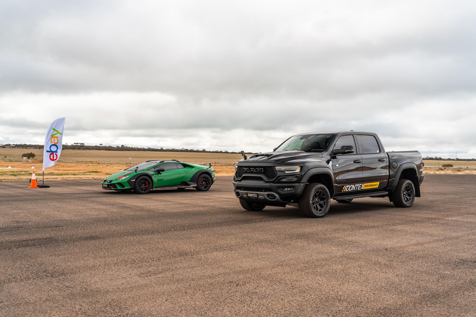 1200hp RAM TRX vs Lamborghini Huracan Sterrato drag race | CarExpert