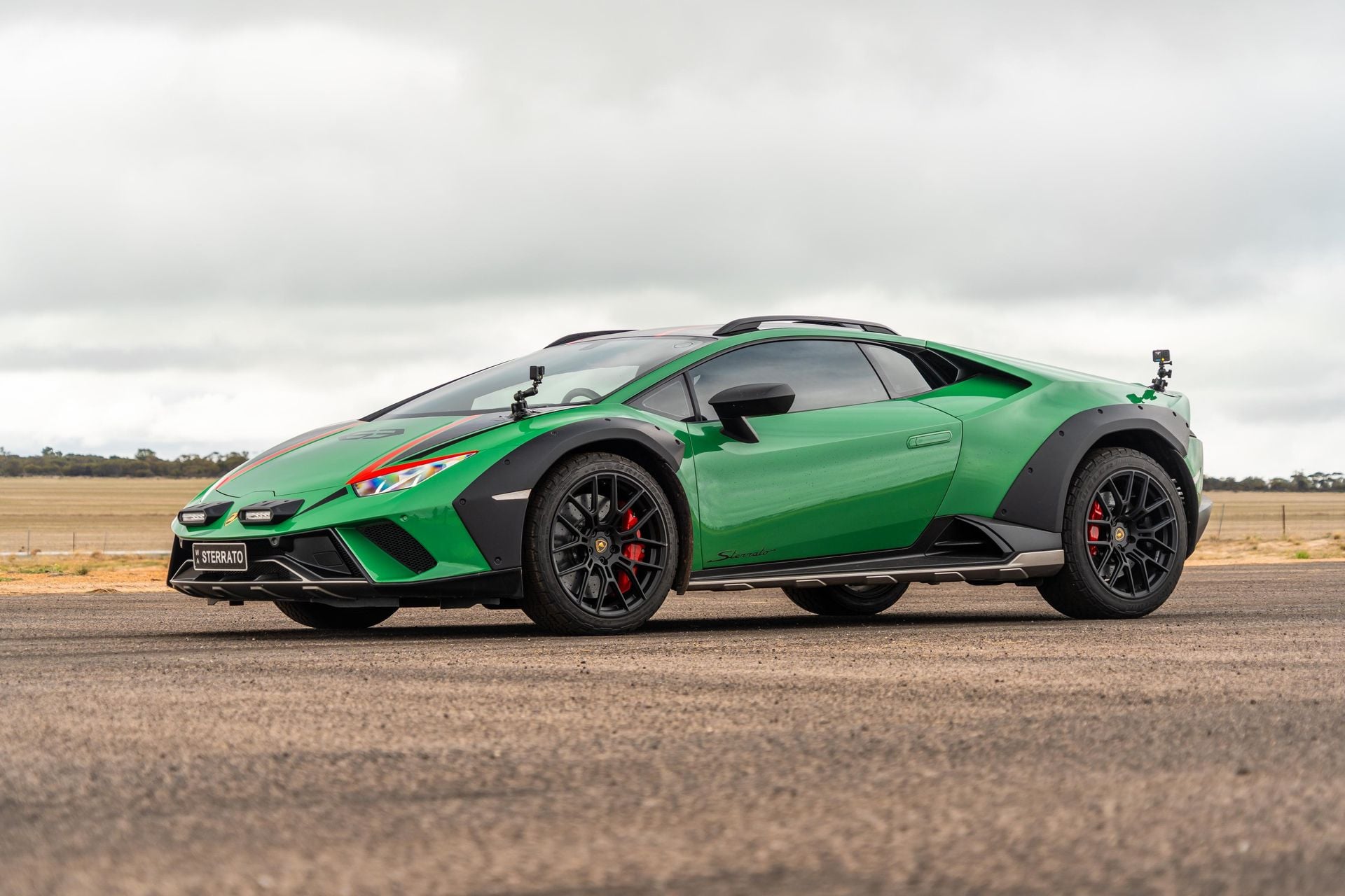 1200hp RAM TRX vs Lamborghini Huracan Sterrato drag race | CarExpert