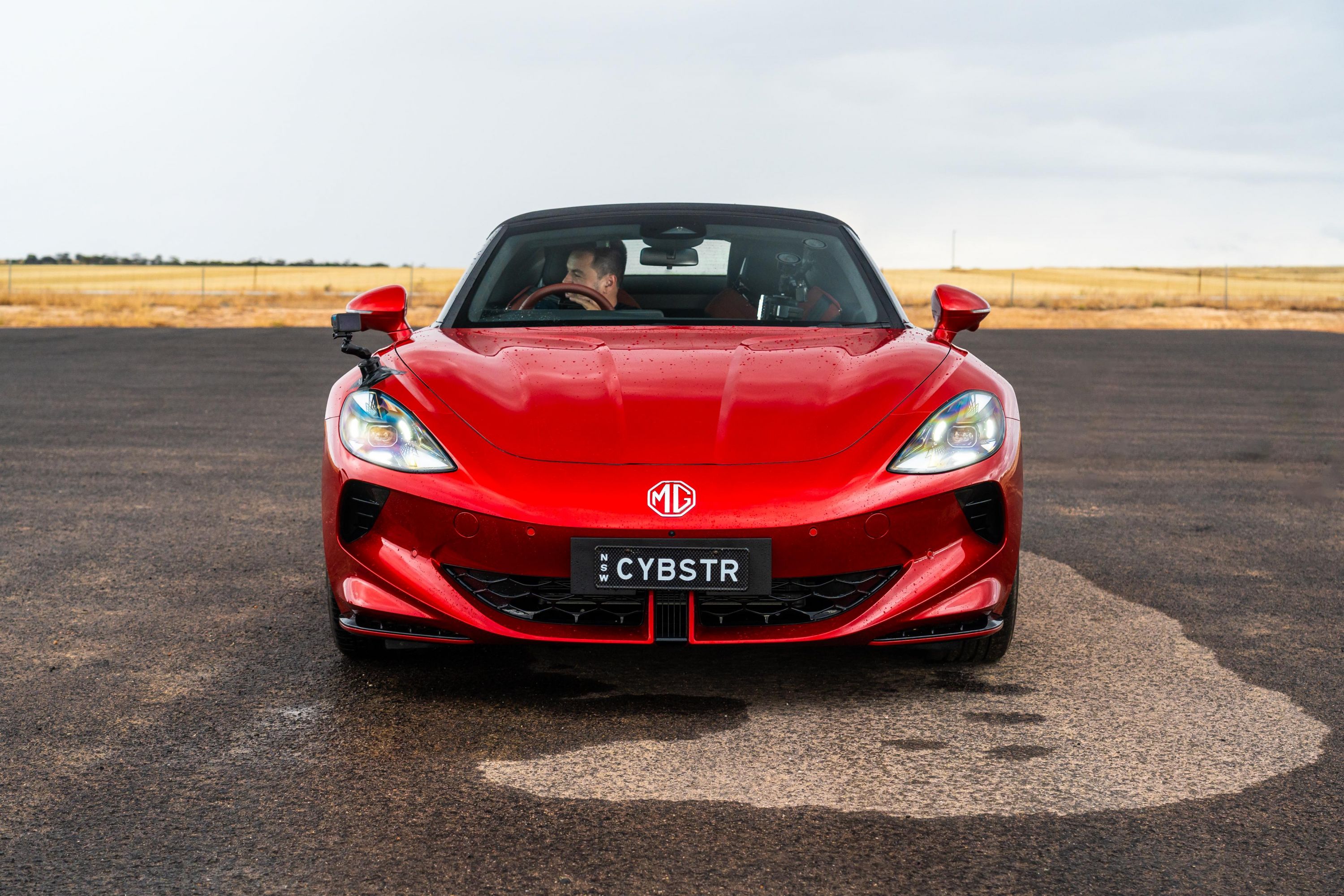 2025 MG Cyberster vs Aston Martin V12 Vantage drag race | CarExpert