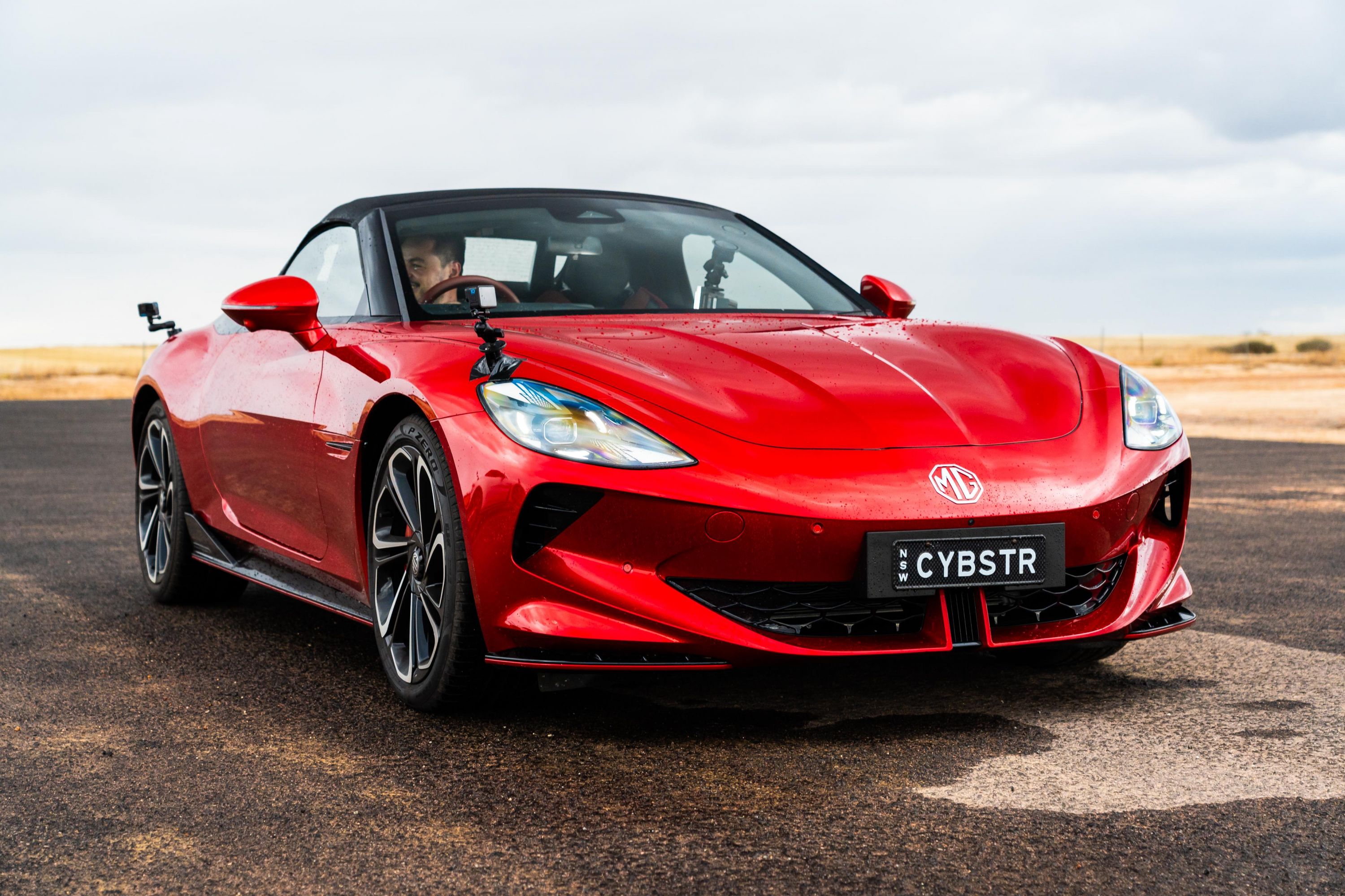 2025 MG Cyberster vs Aston Martin V12 Vantage drag race | CarExpert